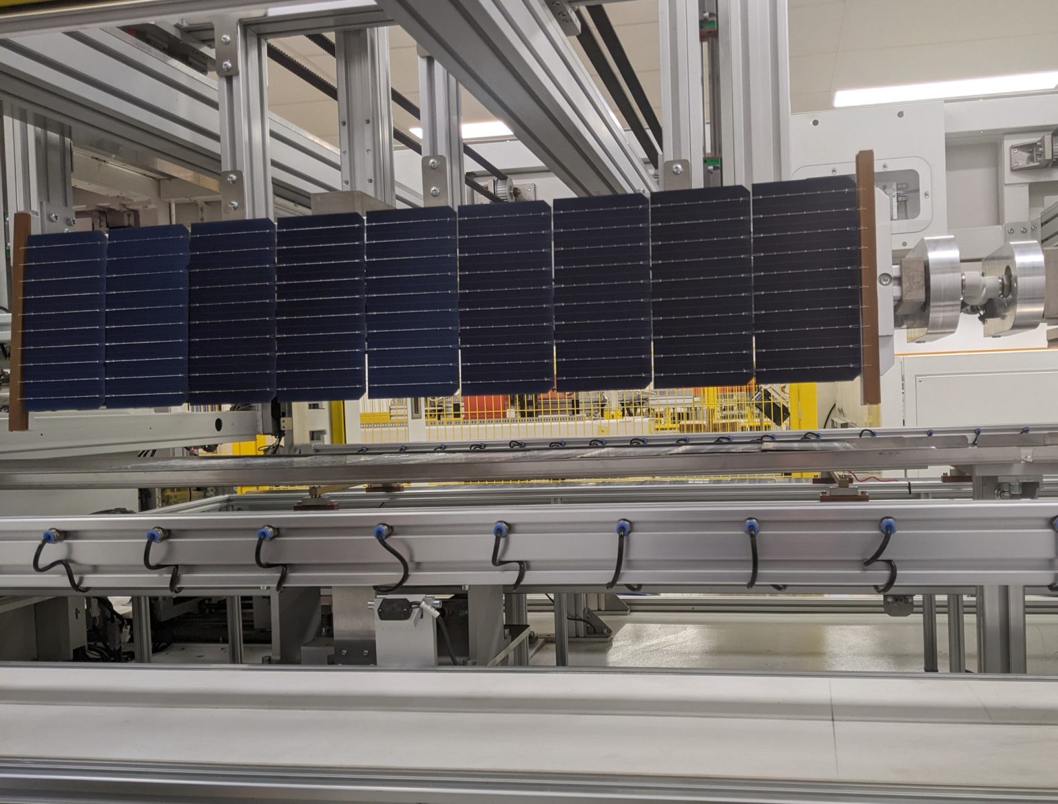 Behind-the-scenes look at solar panel production shines light on ...