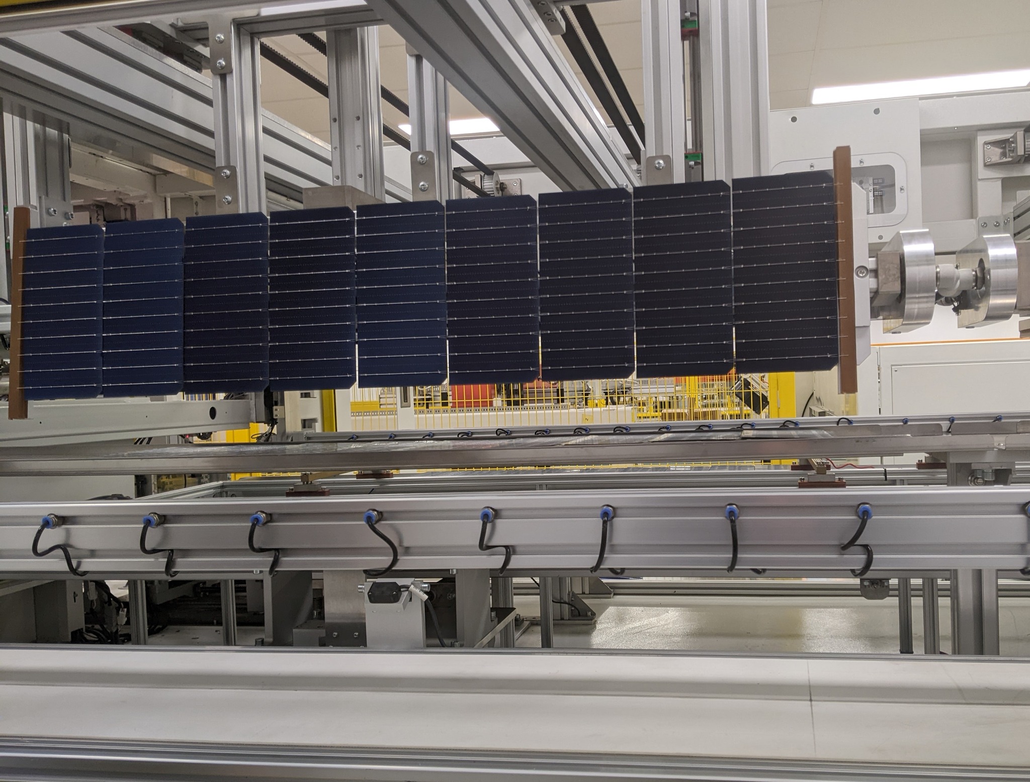Behind-the-scenes look at solar panel production shines light on ...